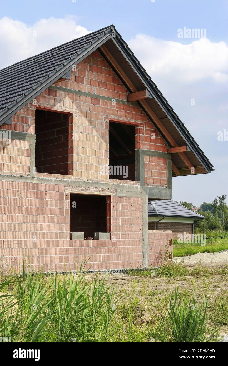 Construction site of a detached house. Suburb place Stock Photo - Alamy