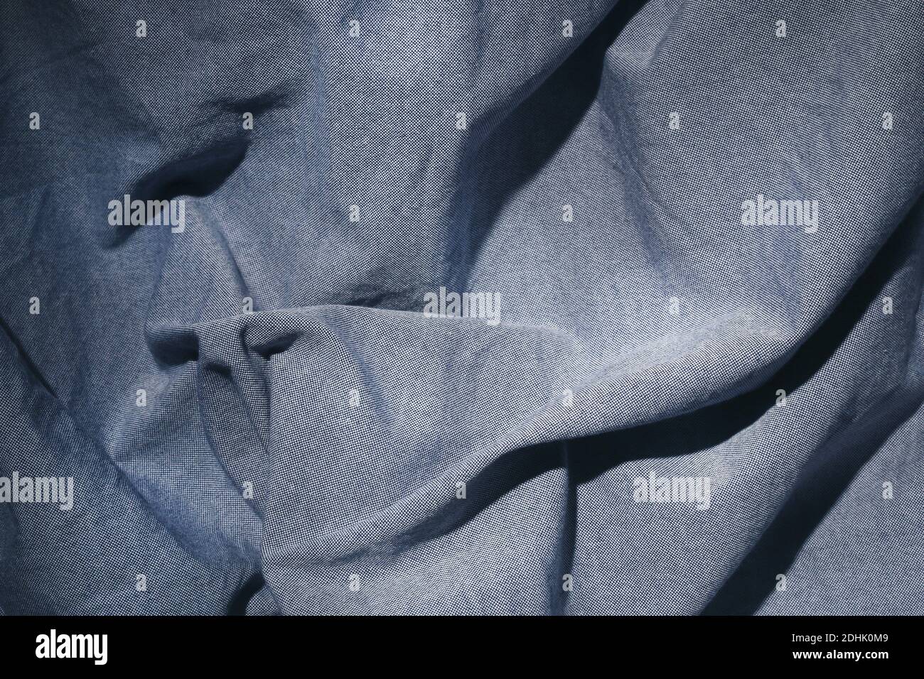 Dramatic lighting on denim fabric. Background, wallpaper Stock Photo ...