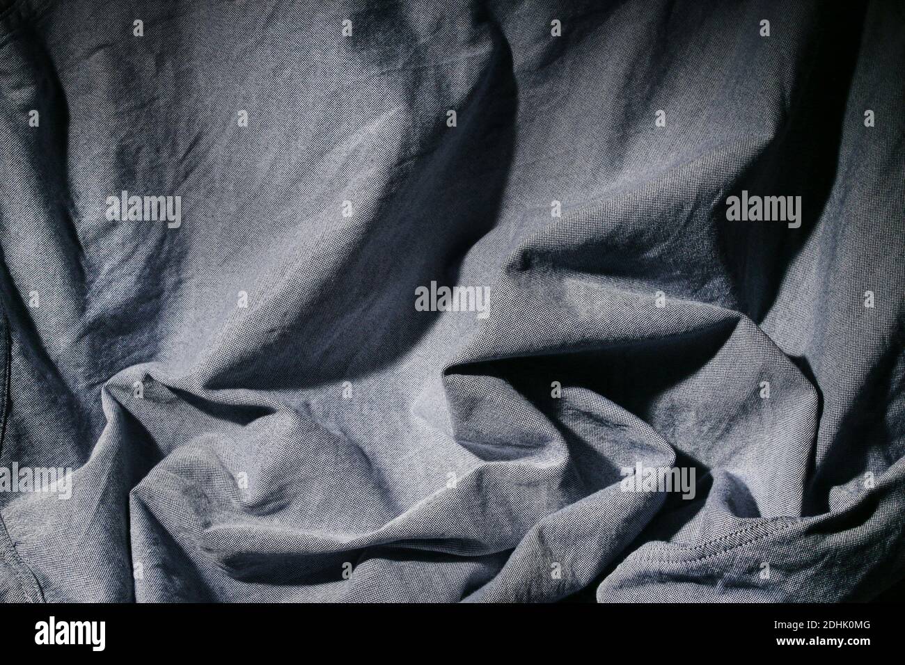Dramatic lighting on denim fabric. Background, wallpaper Stock Photo ...