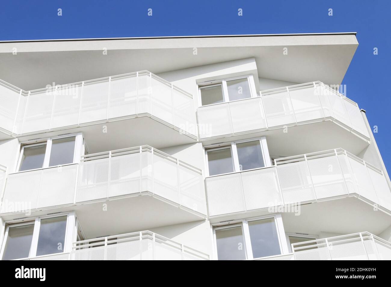 Modern all white apartment building Stock Photo - Alamy