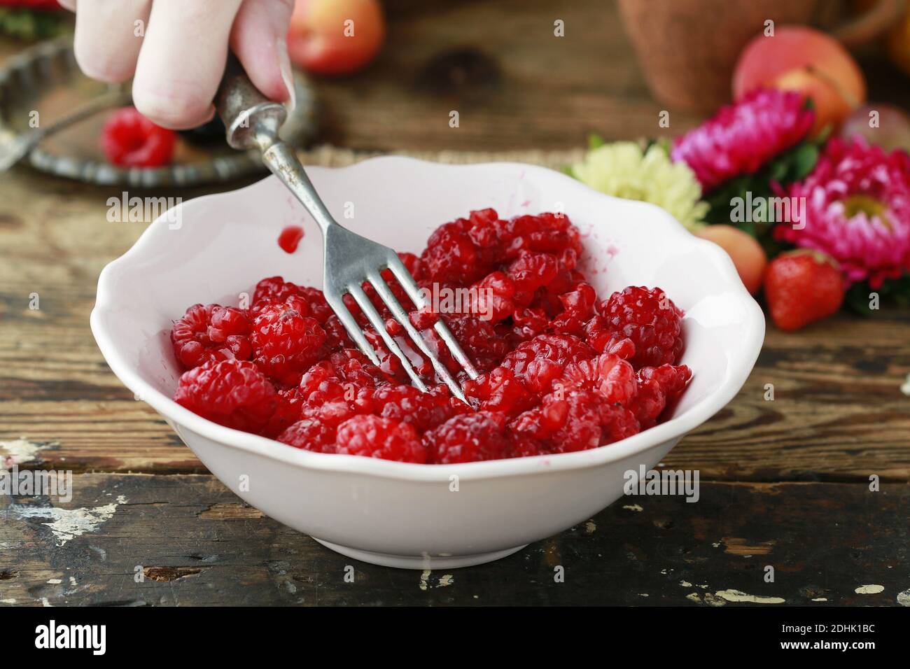 Preparing raspberry preserves. Bowl with ripe fruits. Healthy food ...