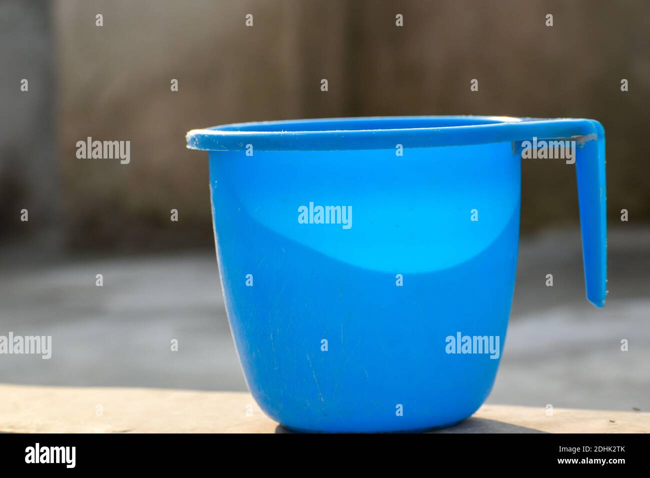 A beautiful Blue plastic bath mug with high resolution Stock Photo - Alamy