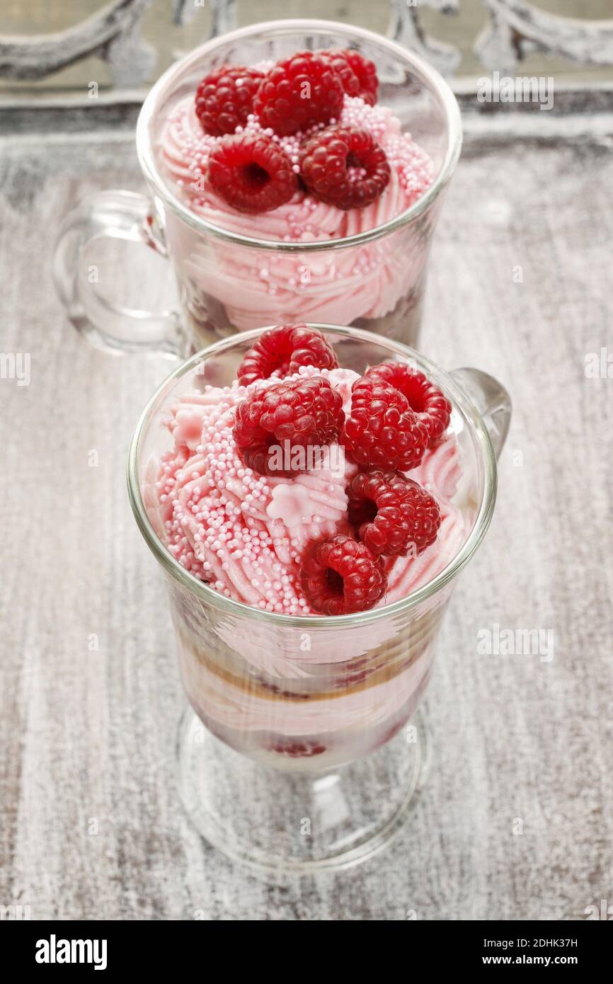 Raspberry layer dessert. Party dish Stock Photo - Alamy