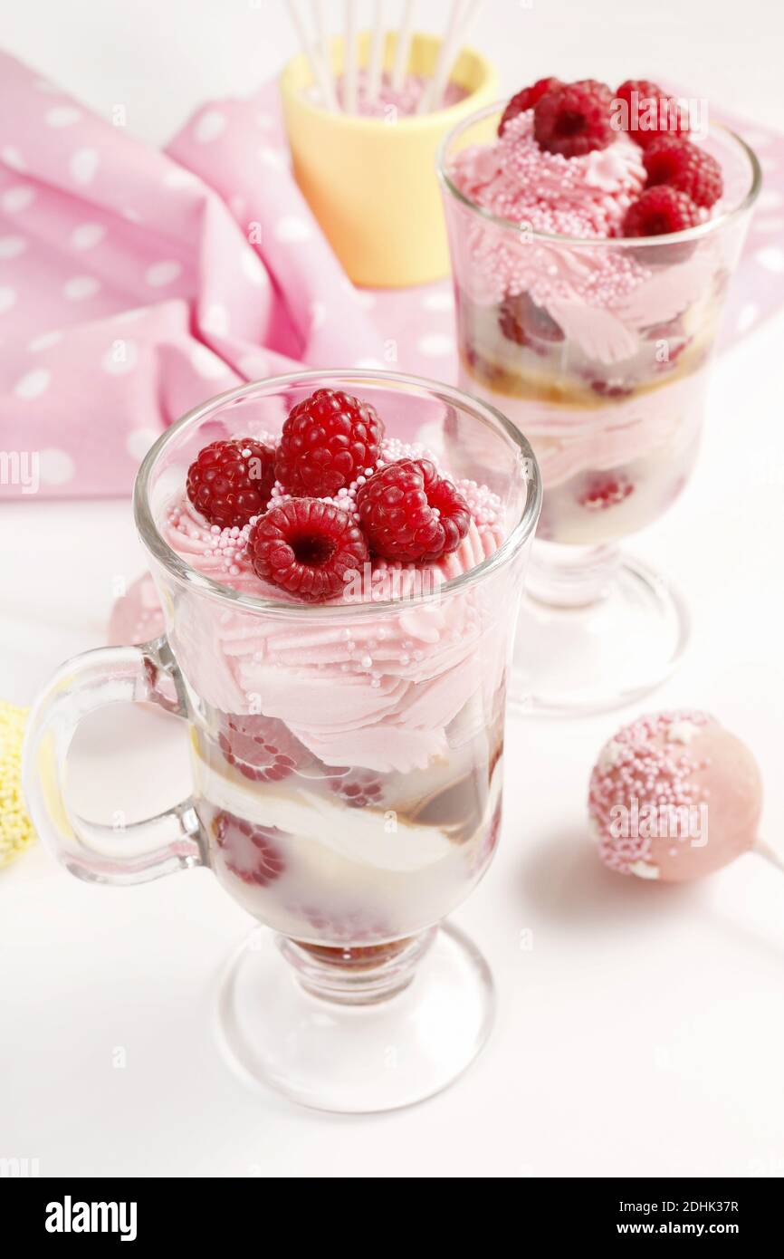 Raspberry layer dessert. Party dish Stock Photo - Alamy