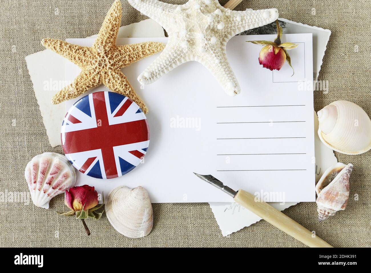 Postcard with blank space for your greetings, shells around. The flag ...