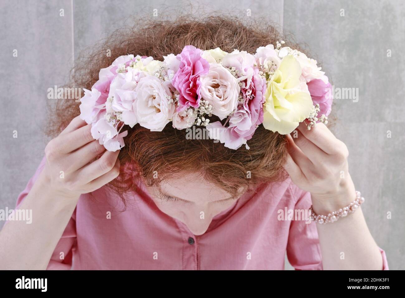 Woman wearing beautiful wedding flower crown. Party decor Stock Photo ...