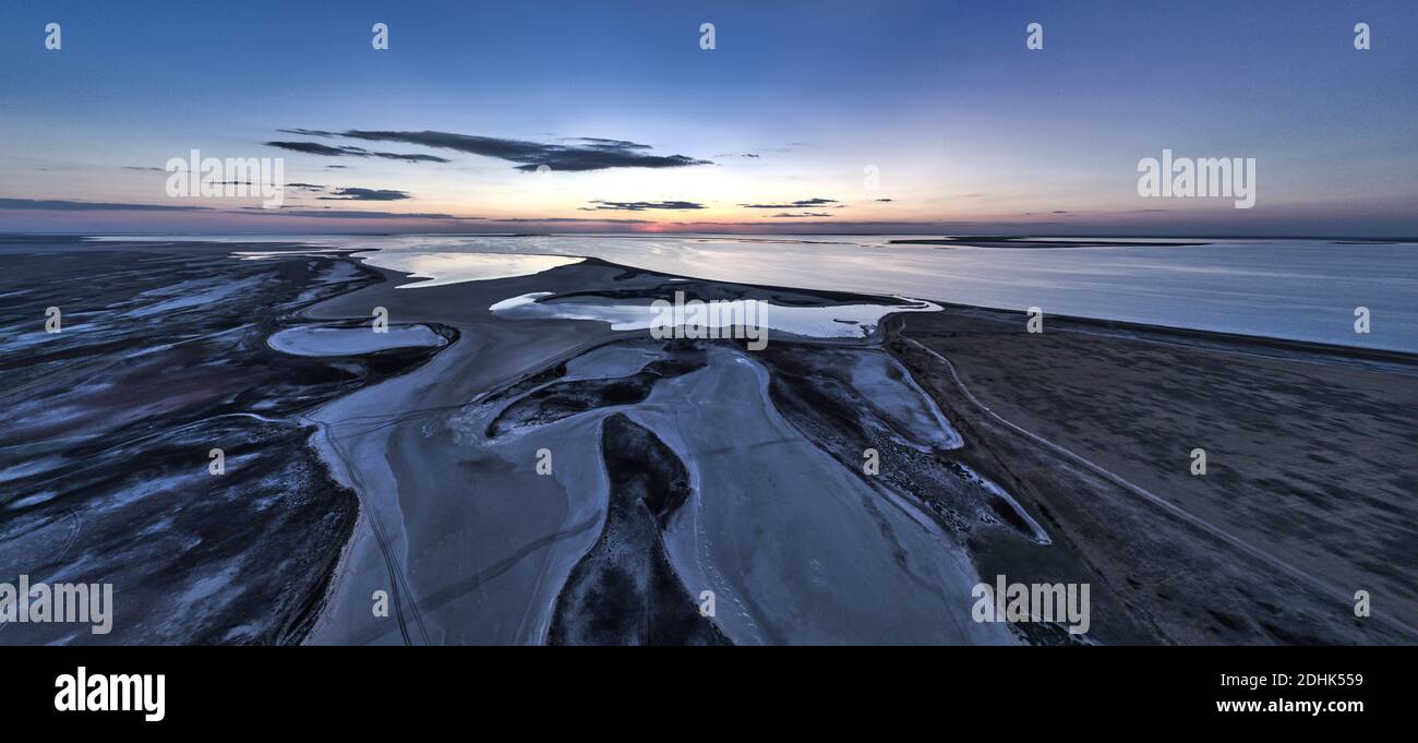 Unusual islands on a brilliant lake, top view, drone camera Stock Photo ...