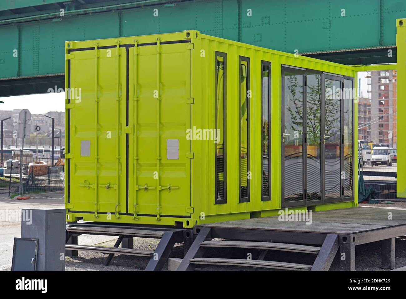 Converted green shipping container recycling living use Stock Photo - Alamy