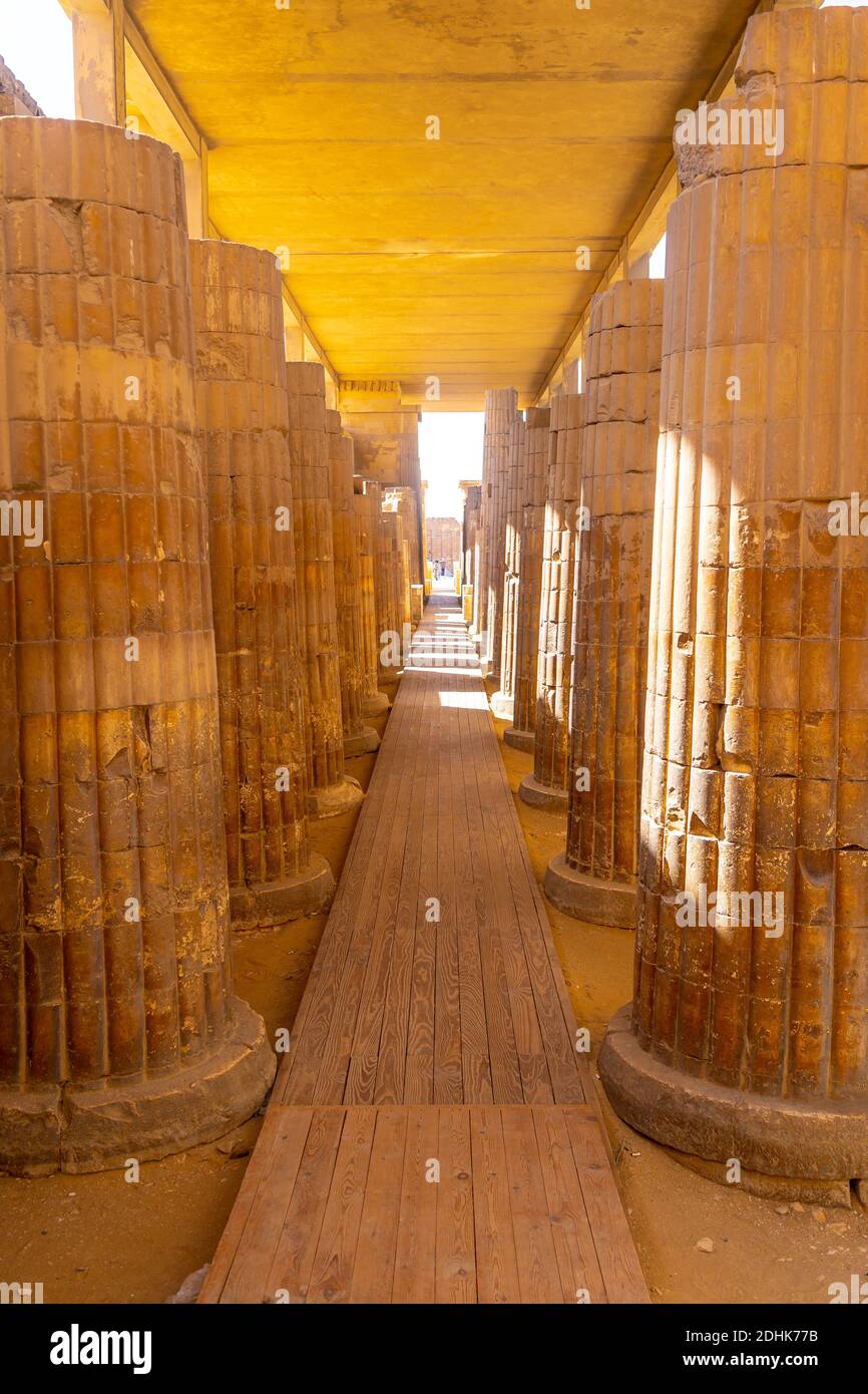 A vertical shot of a hallway inside the Pyramid of Saqqara captured in ...
