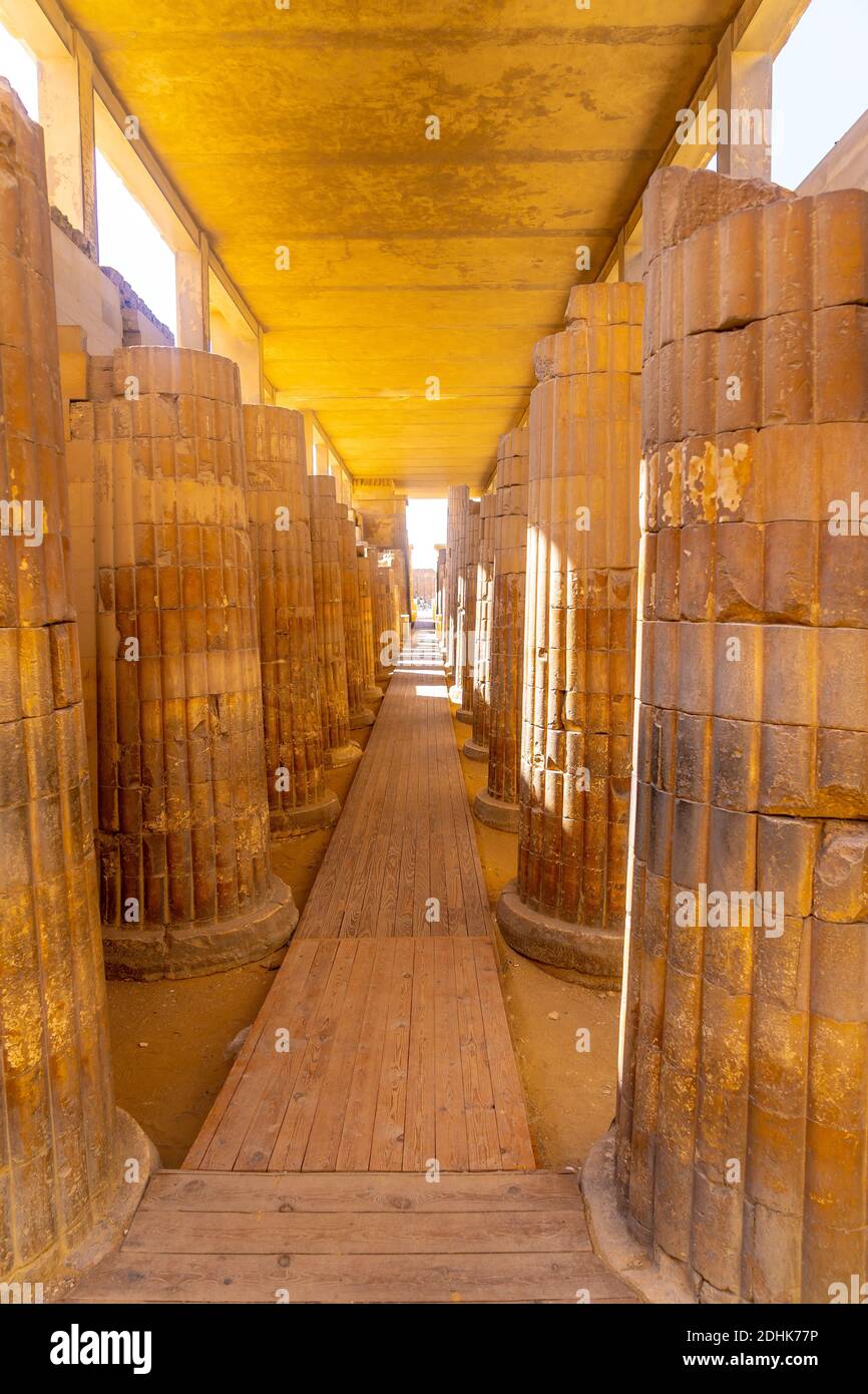 A vertical shot of a hallway inside the Pyramid of Saqqara captured in ...