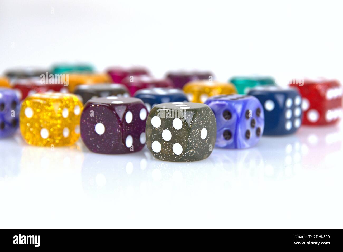 Deutschland. 08th Dec, 2020. The die is cast". Colorful dice in a row ...