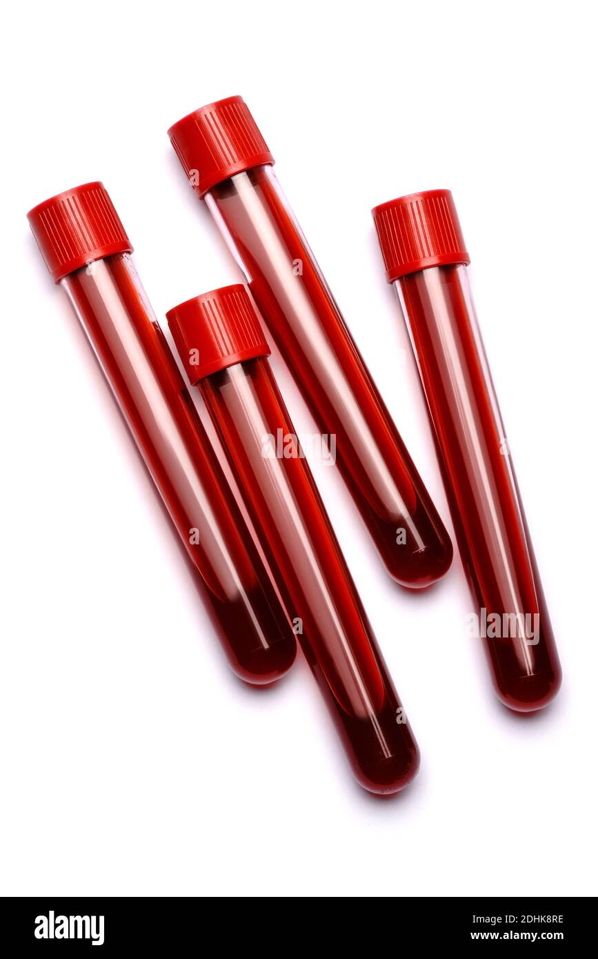 Test tubes with red plug isolated on white background Stock Photo - Alamy