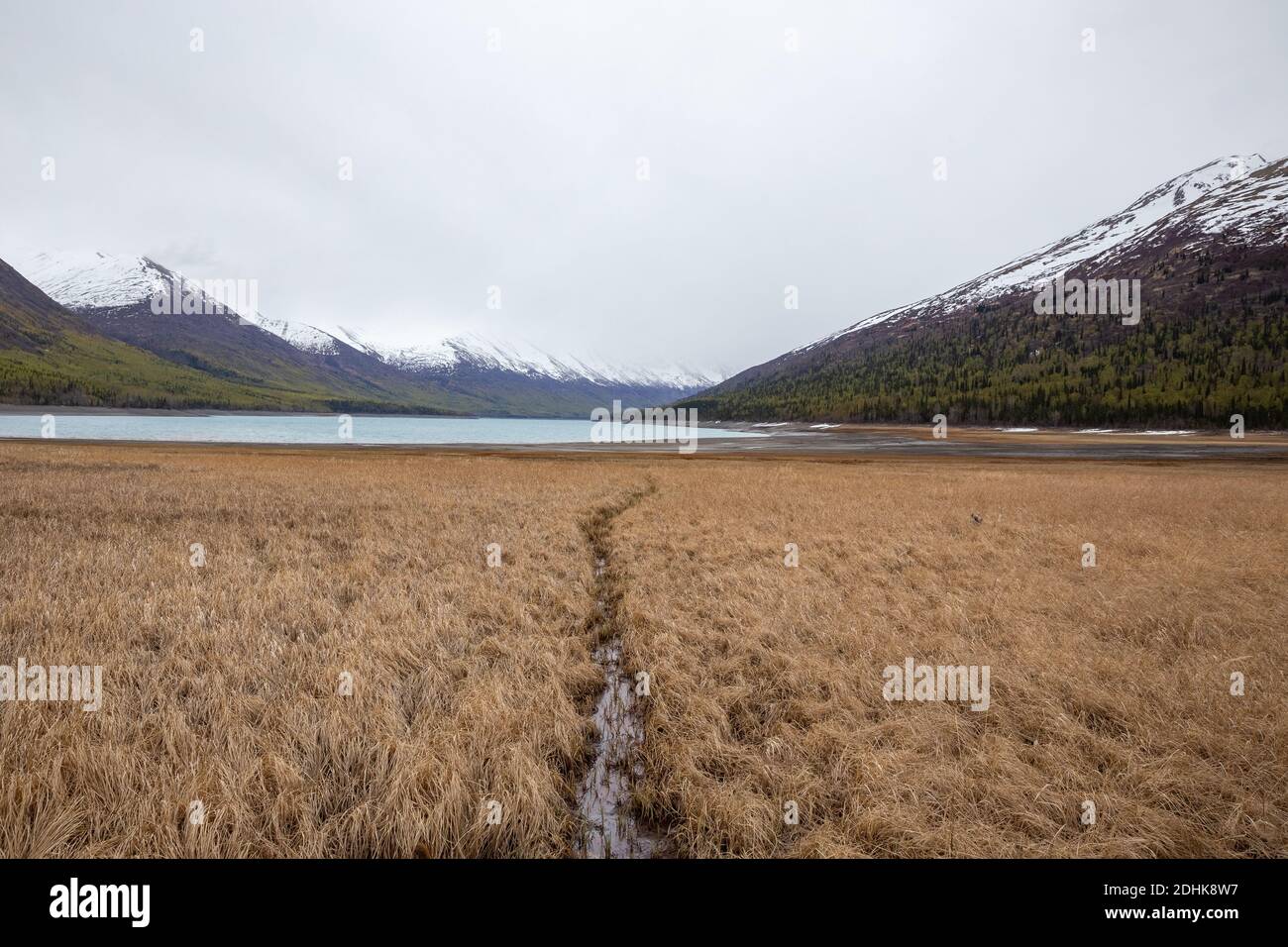 A mesmerizing view of the Eklutna Lake, Alaska:high snowy mountains and ...