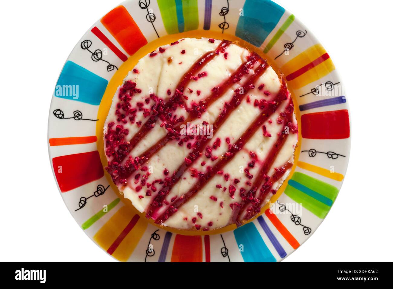 Mary Berry Raspberry Ripple Cake hand decorated set on colourful plate ...