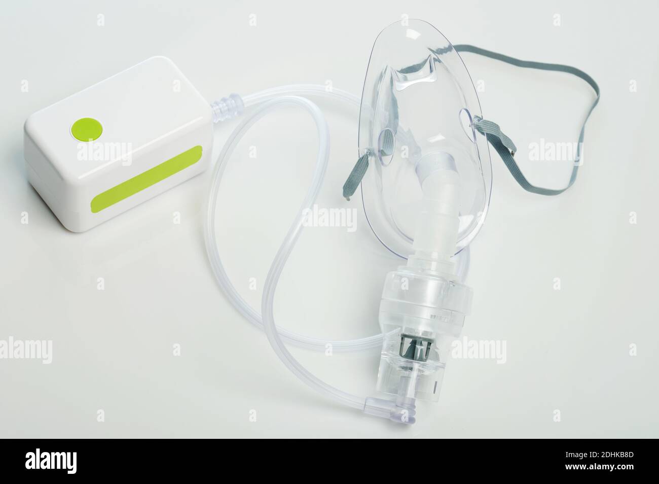 Inhale therapy device with mask isolated on white studio background ...