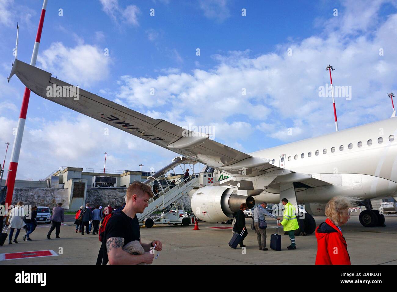 Passengers Entering Airplane Stock Photo - Alamy