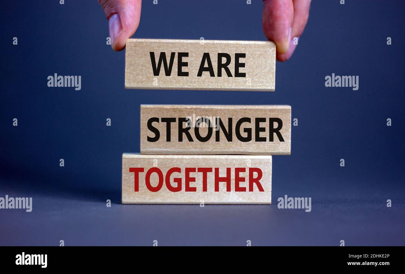 We are stronger together symbol. Wooden blocks form the words 'we are ...