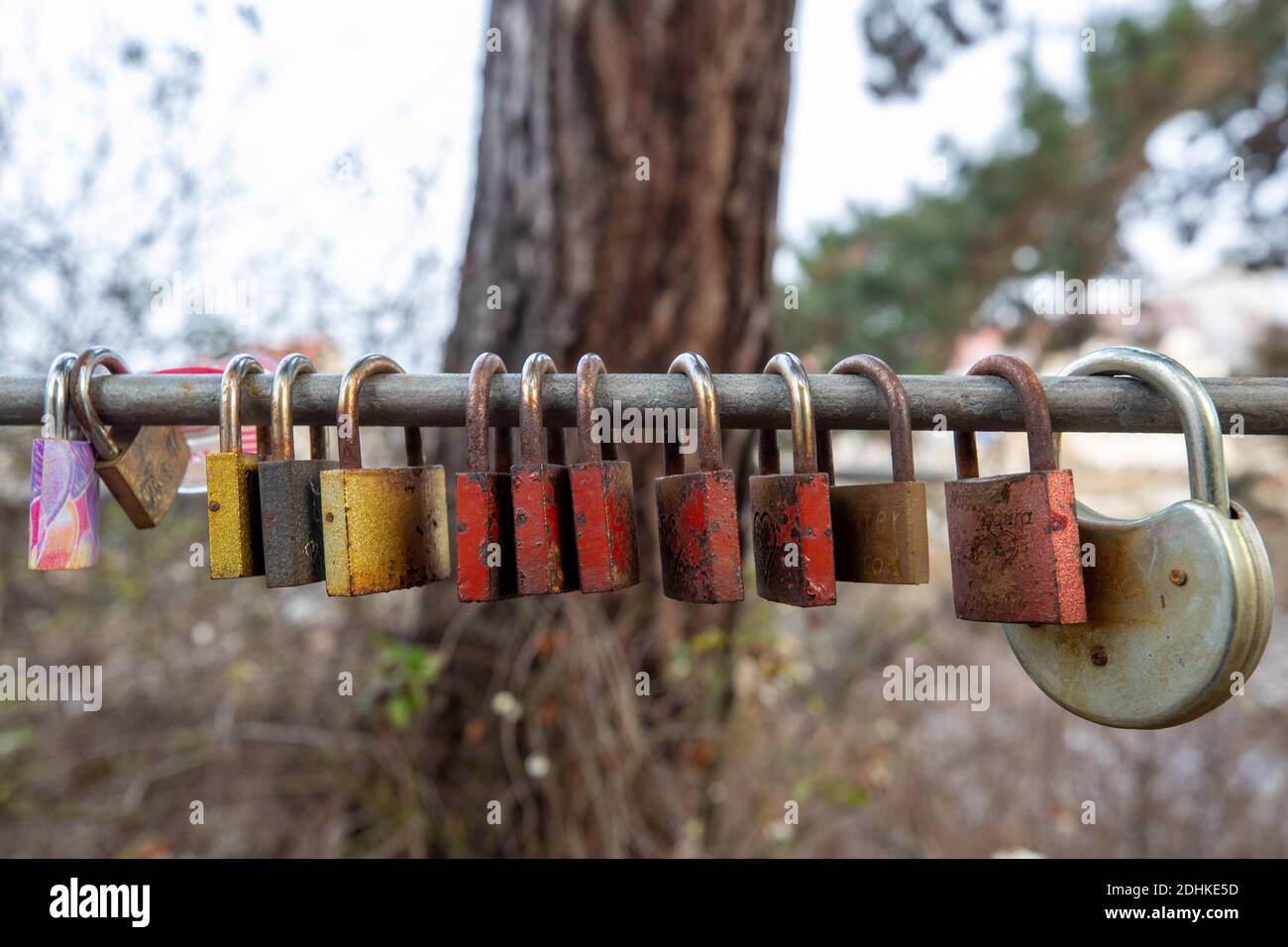 11 December 2020, Saxony, Görlitz: Several castles hang on the railing ...