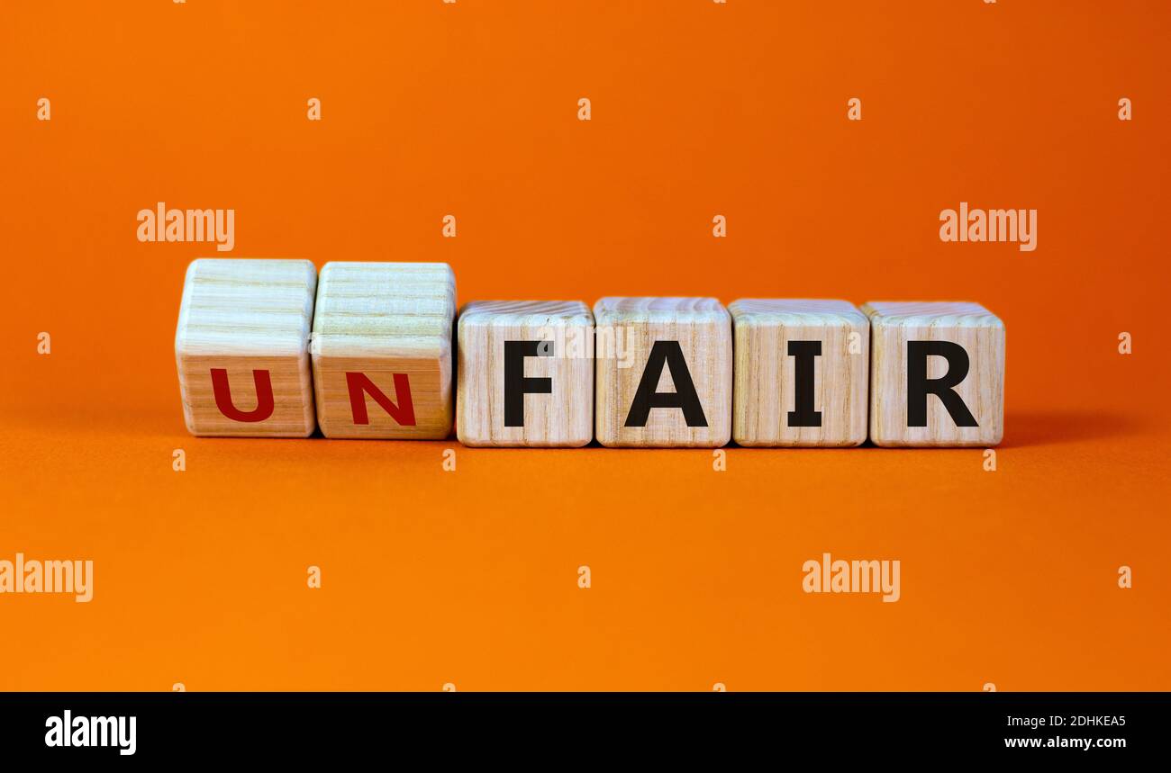 Fair or unfair symbol. Turned a cube and changes words 'unfair' to ...