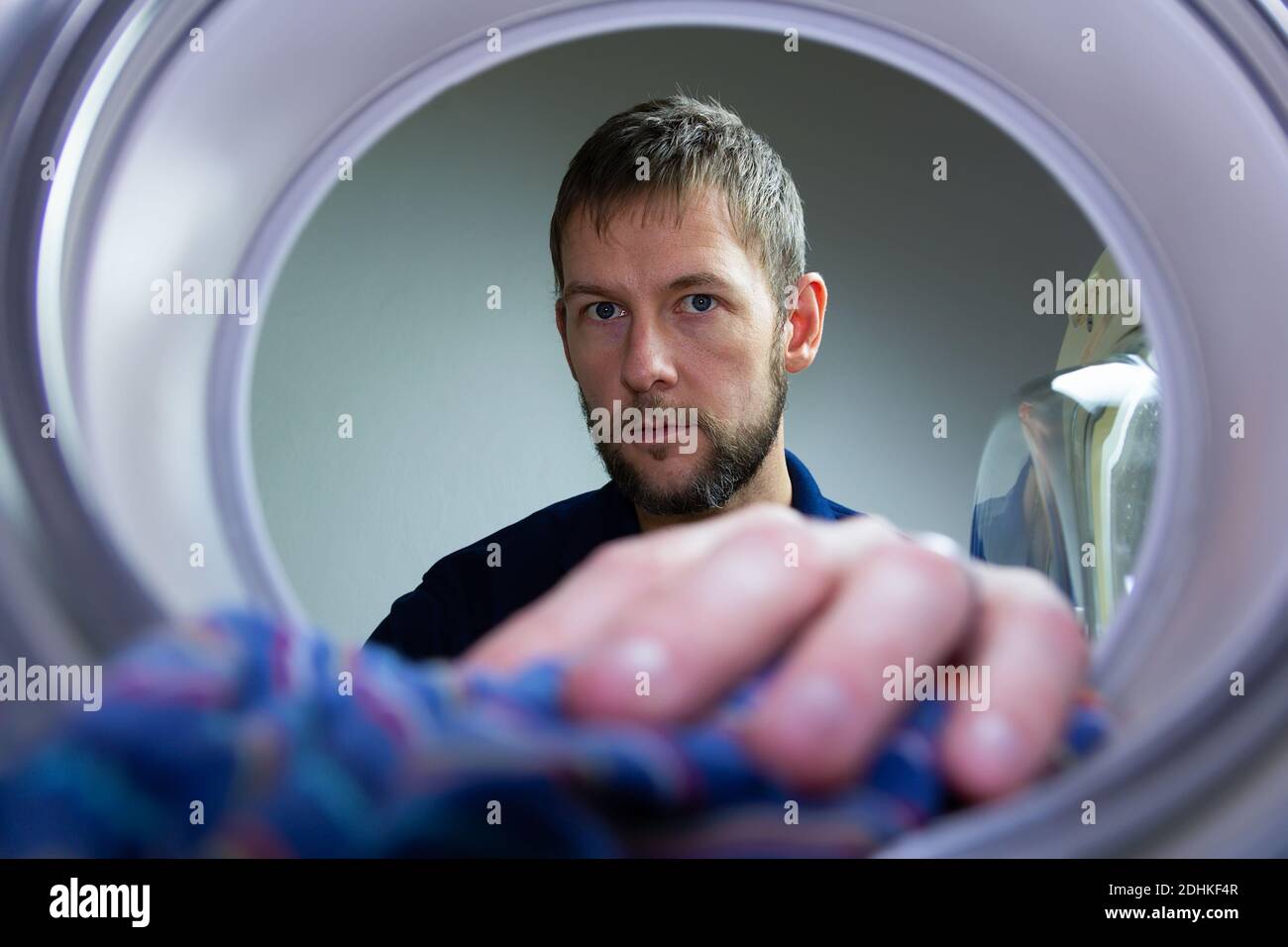 Portrait in washing machine man hi-res stock photography and images - Alamy