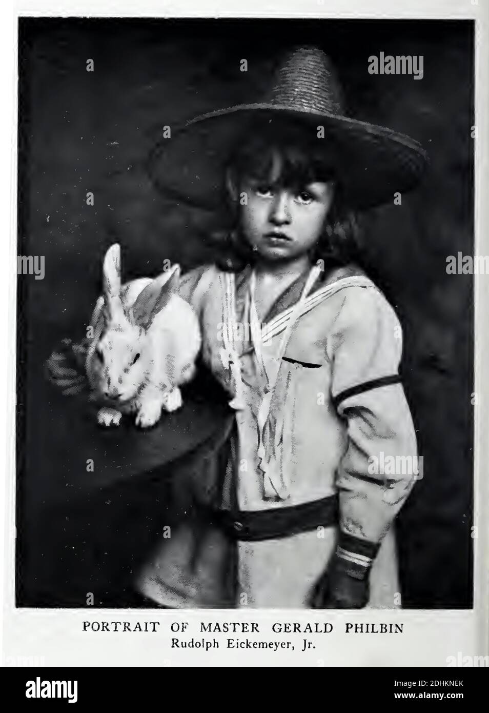 Vintage Rudolph Eickemeyer photograph of a child holding his pet rabbit ...