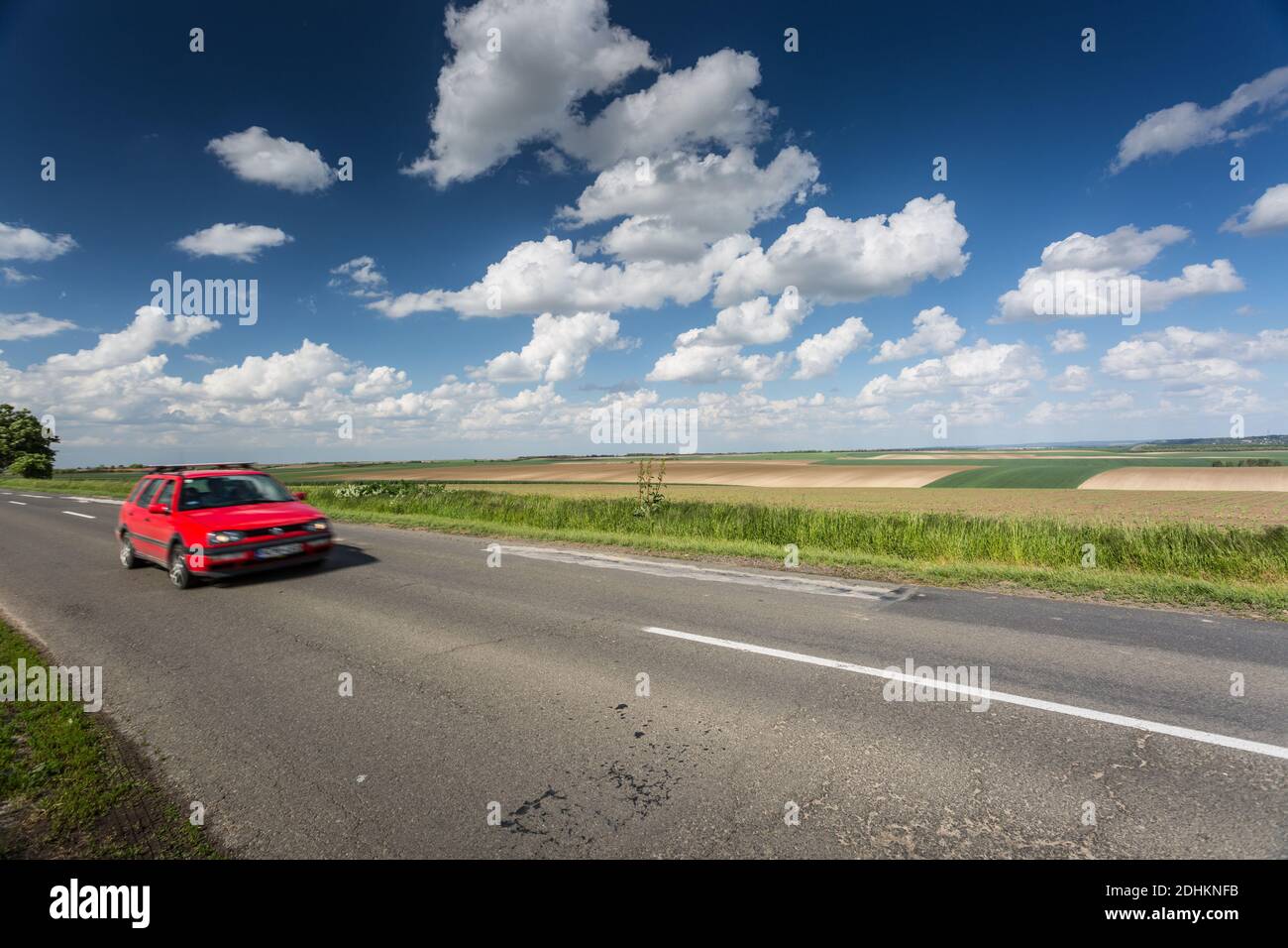 fast moving car with cloud sky Stock Photo - Alamy