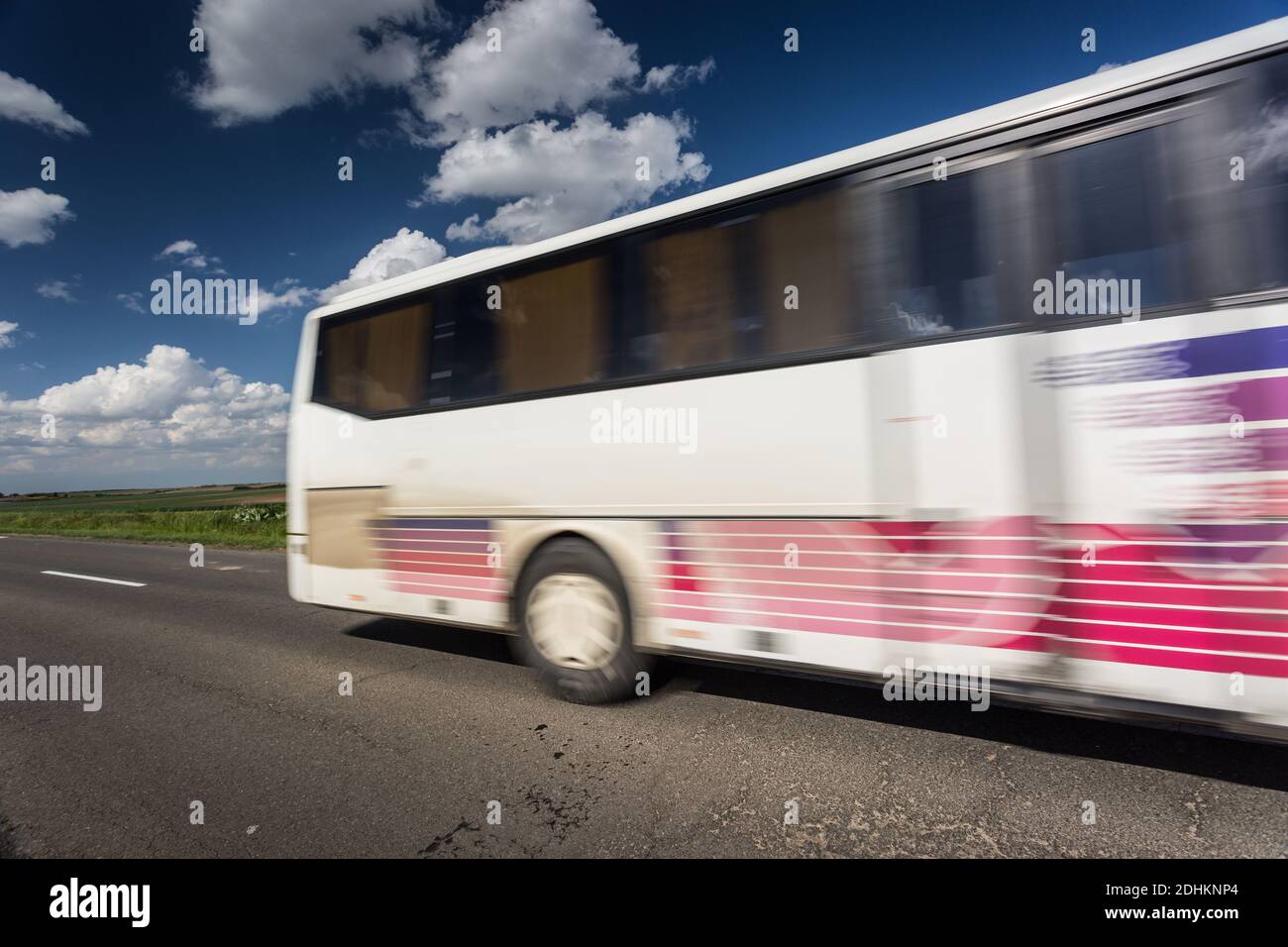 fast moving bus with cloud sky Stock Photo - Alamy