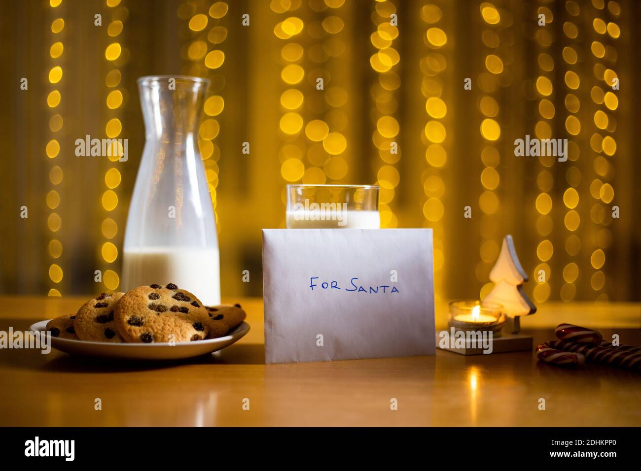 Christmas cookies milk note for Santa in front of lights Stock Photo ...