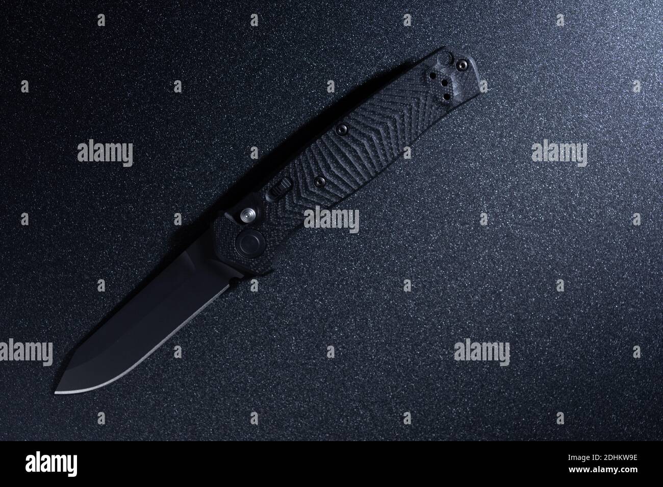 Diagonal black knife. Premium class knife. Top Stock Photo - Alamy