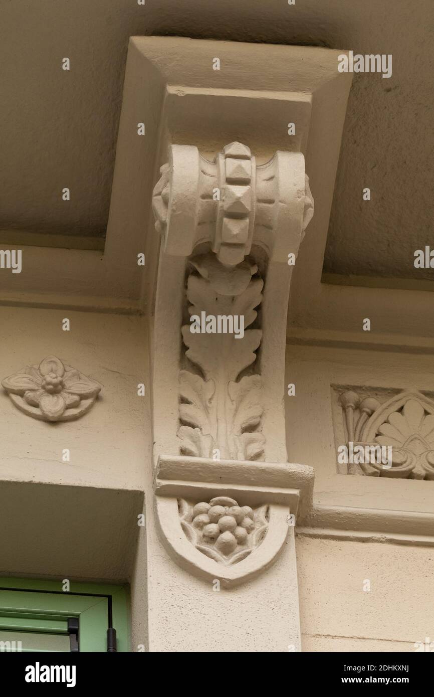 Elements of architectural decorations of buildings, a beam under the ...