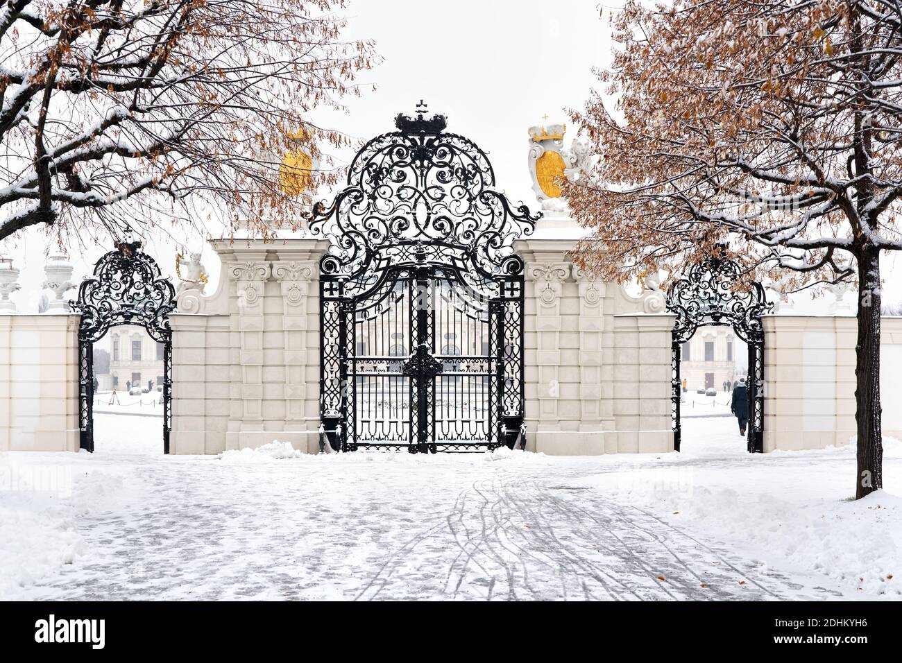 Entrance gate from side to upper Belvedere palace in Vienna in snowy ...