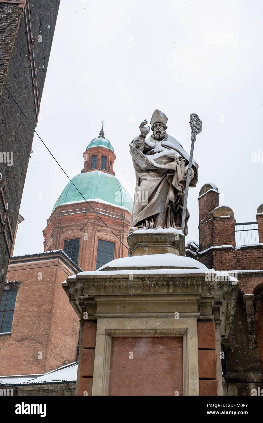 Snow falling on the statue of St Petronius - San Petronio. Bologna ...