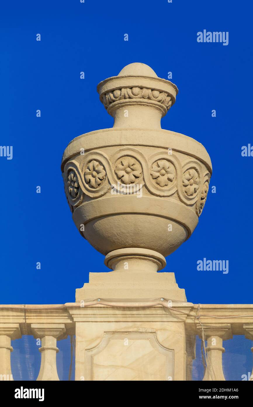 Plaster vases, elements of architectural decorations of buildings ...