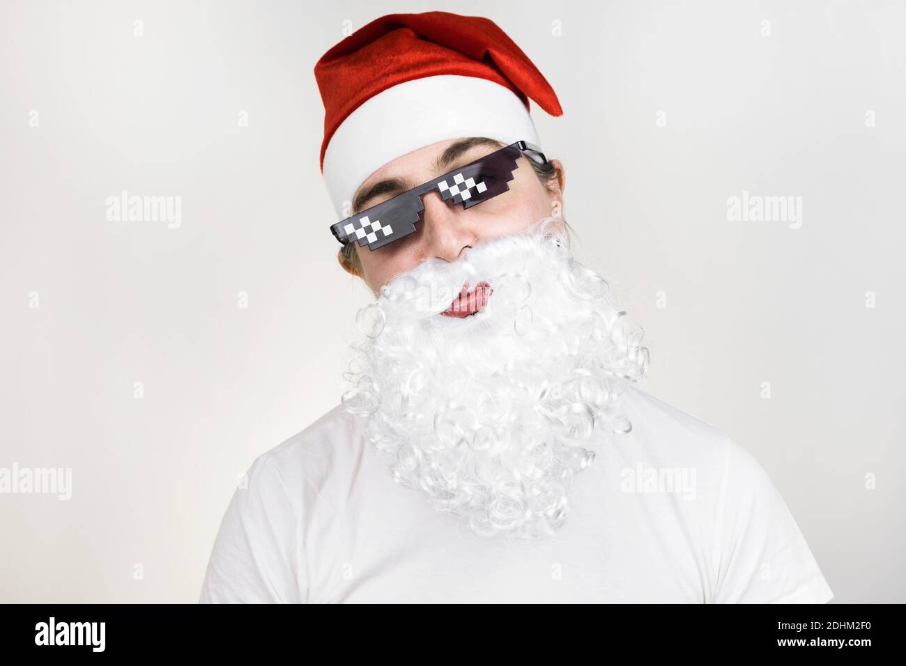 Swag Santa Claus in funny pixelated sunglasses on white background ...