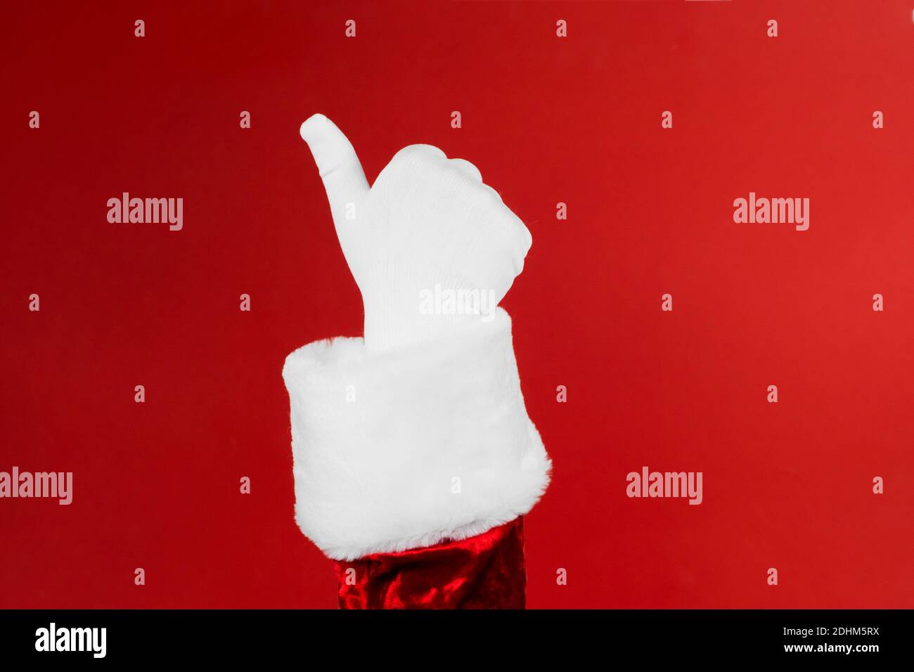 Santa Claus Hand Thumb Up Gesture on red background. Finger up. Like ...