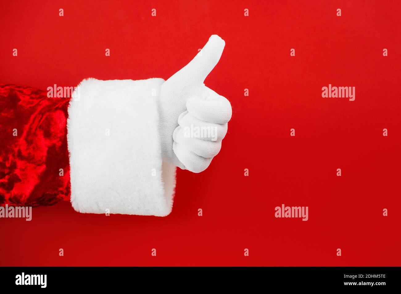 Santa Claus Hand Thumb Up Gesture on red background. Finger up. Like ...