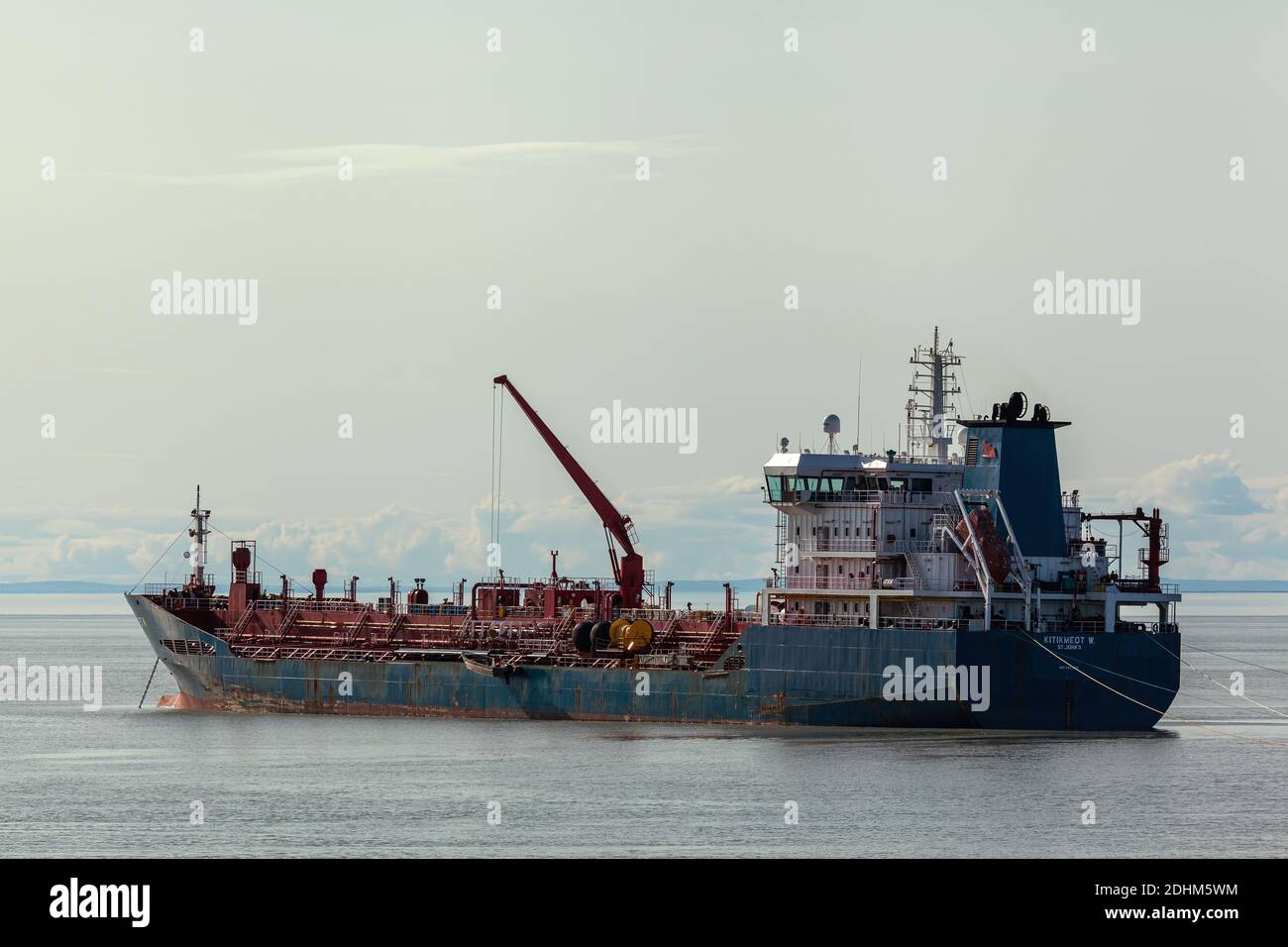 Small cargo boat anchoring hi-res stock photography and images - Alamy