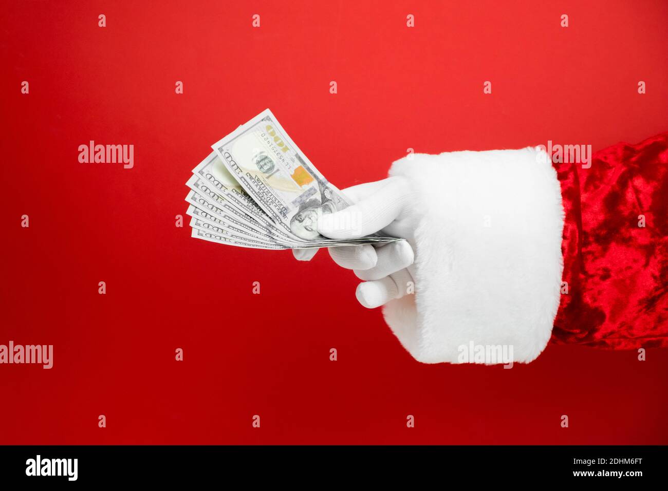 Santa claus giving money hi-res stock photography and images - Alamy