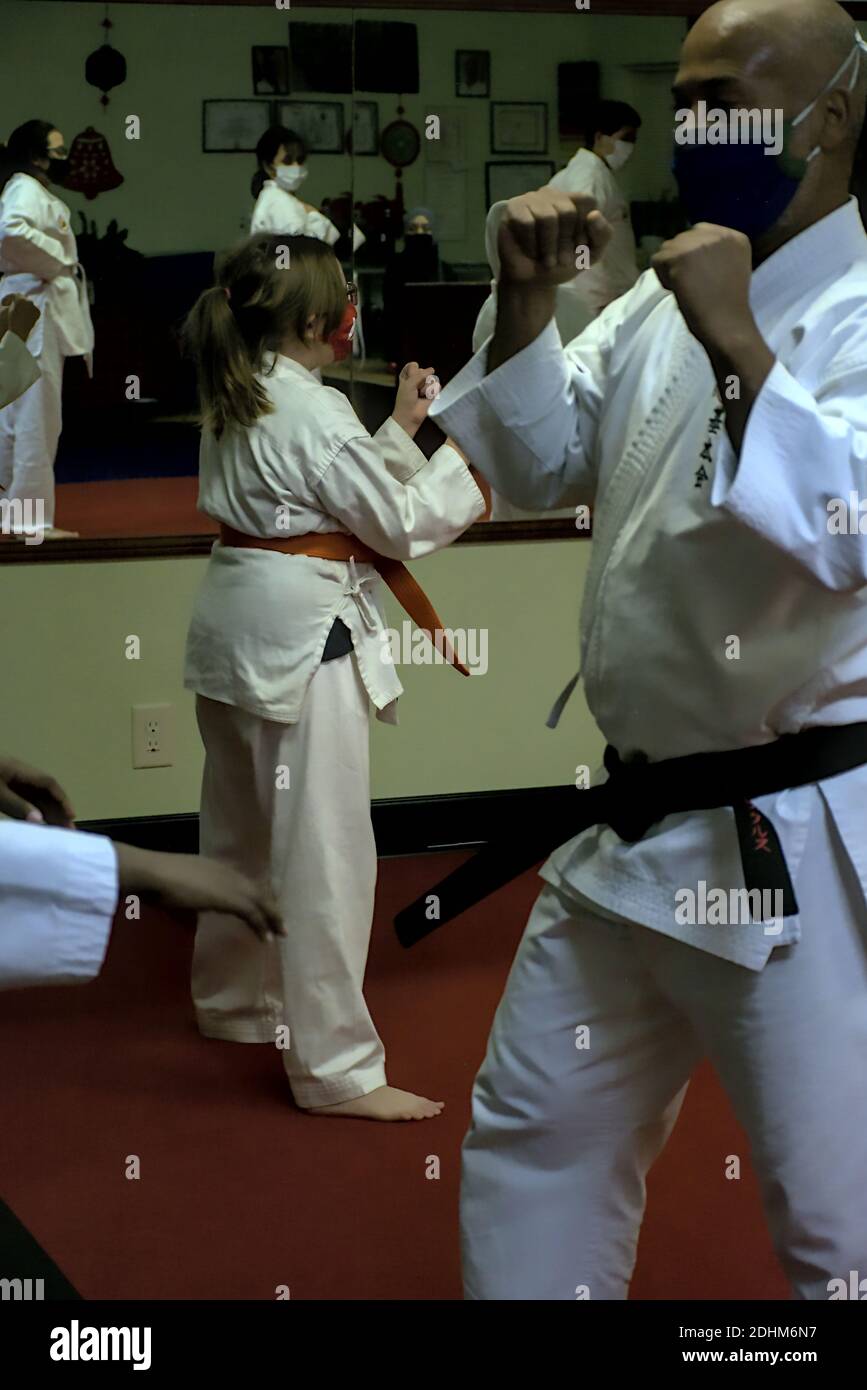 This action photo is of my daughter and her classmates in a Karate ...