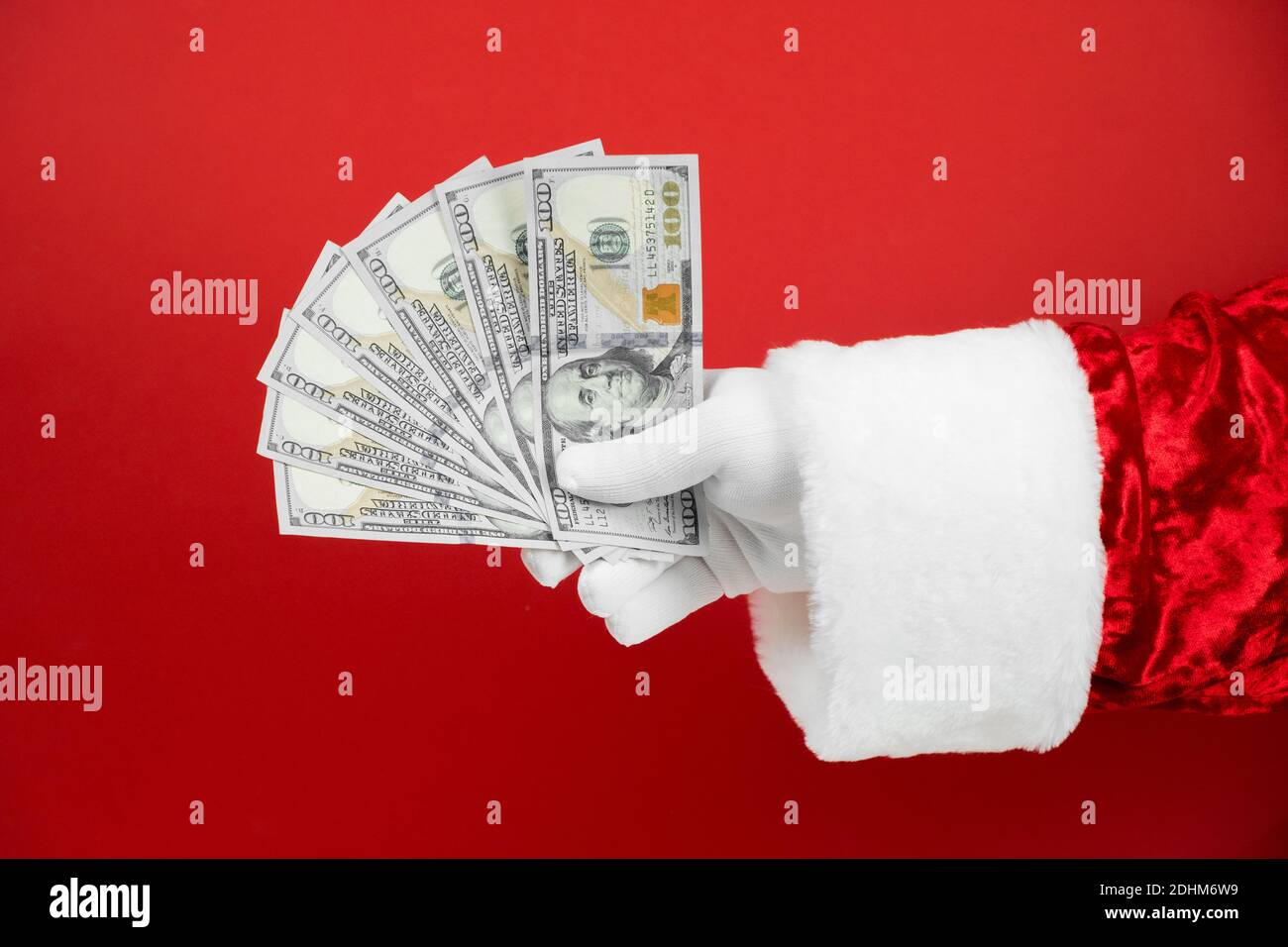 Santa claus giving money hi-res stock photography and images - Alamy