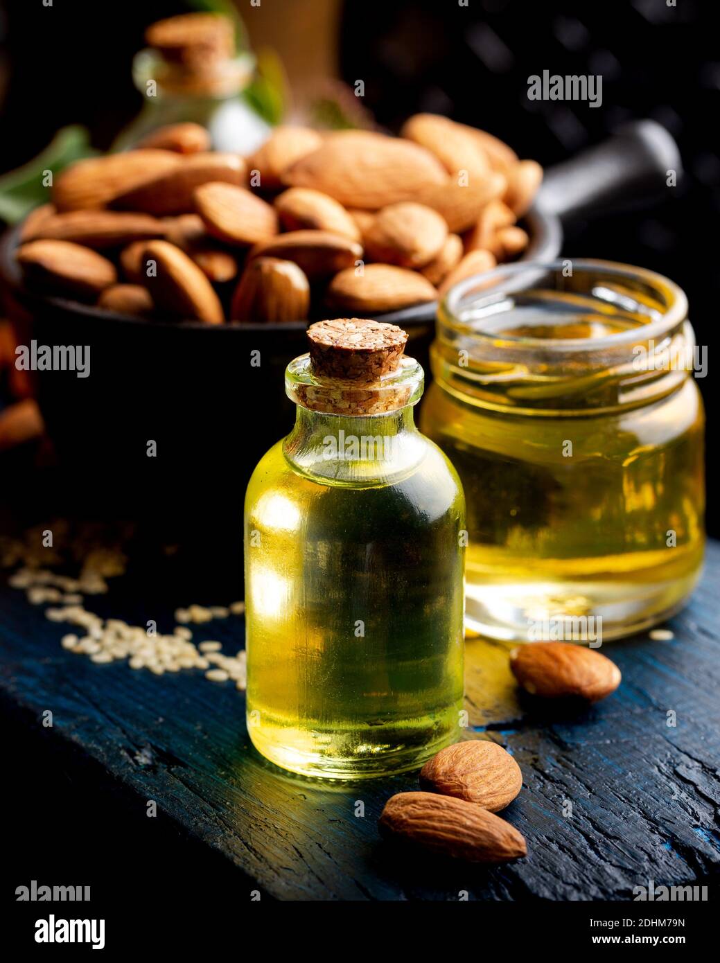 Concept of organic vegetable oils for cooking and cosmetology. Almond ...