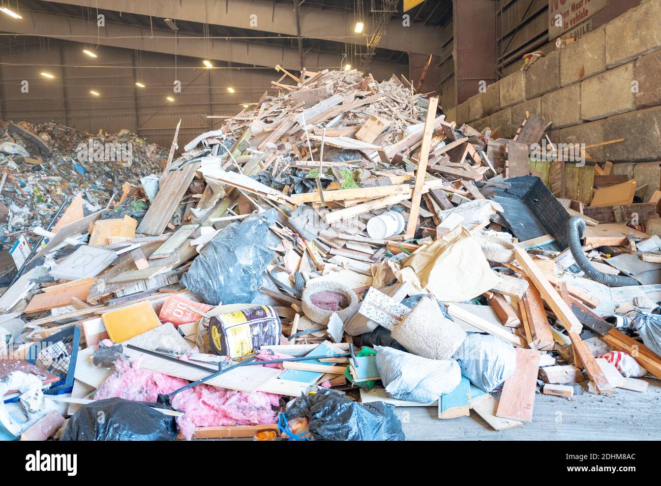 Large pile of municipal solid waste and garbage is visible at the ...