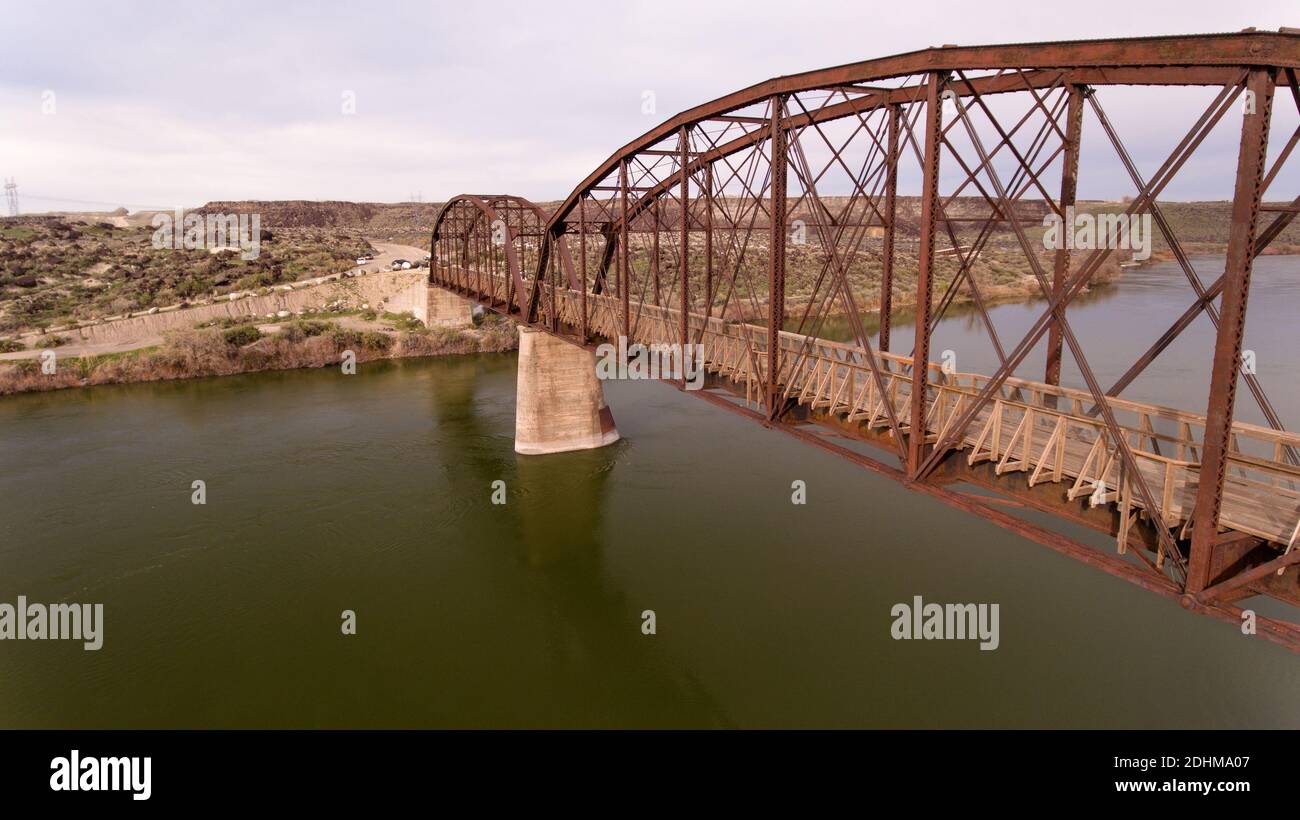 wooden foot bridge that is over water Stock Photo - Alamy