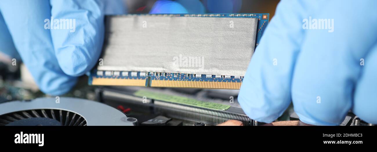 Replacing computer board in a laptop closeup Stock Photo - Alamy