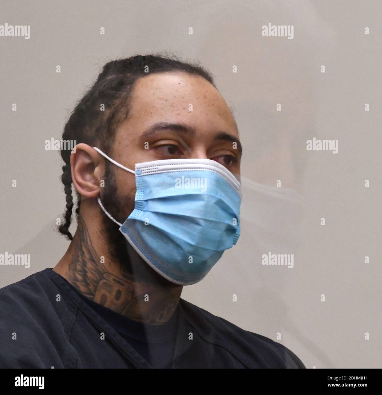 Racine, Wisconsin, USA. 11th Dec, 2020. DALQUAVIS WARD listens without ...