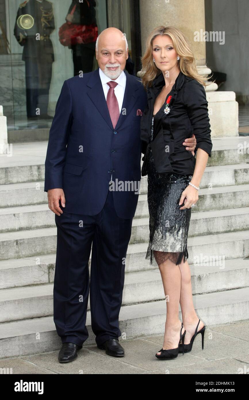 Celine Dion poses with her husband Renee Angelil after she was awarded ...