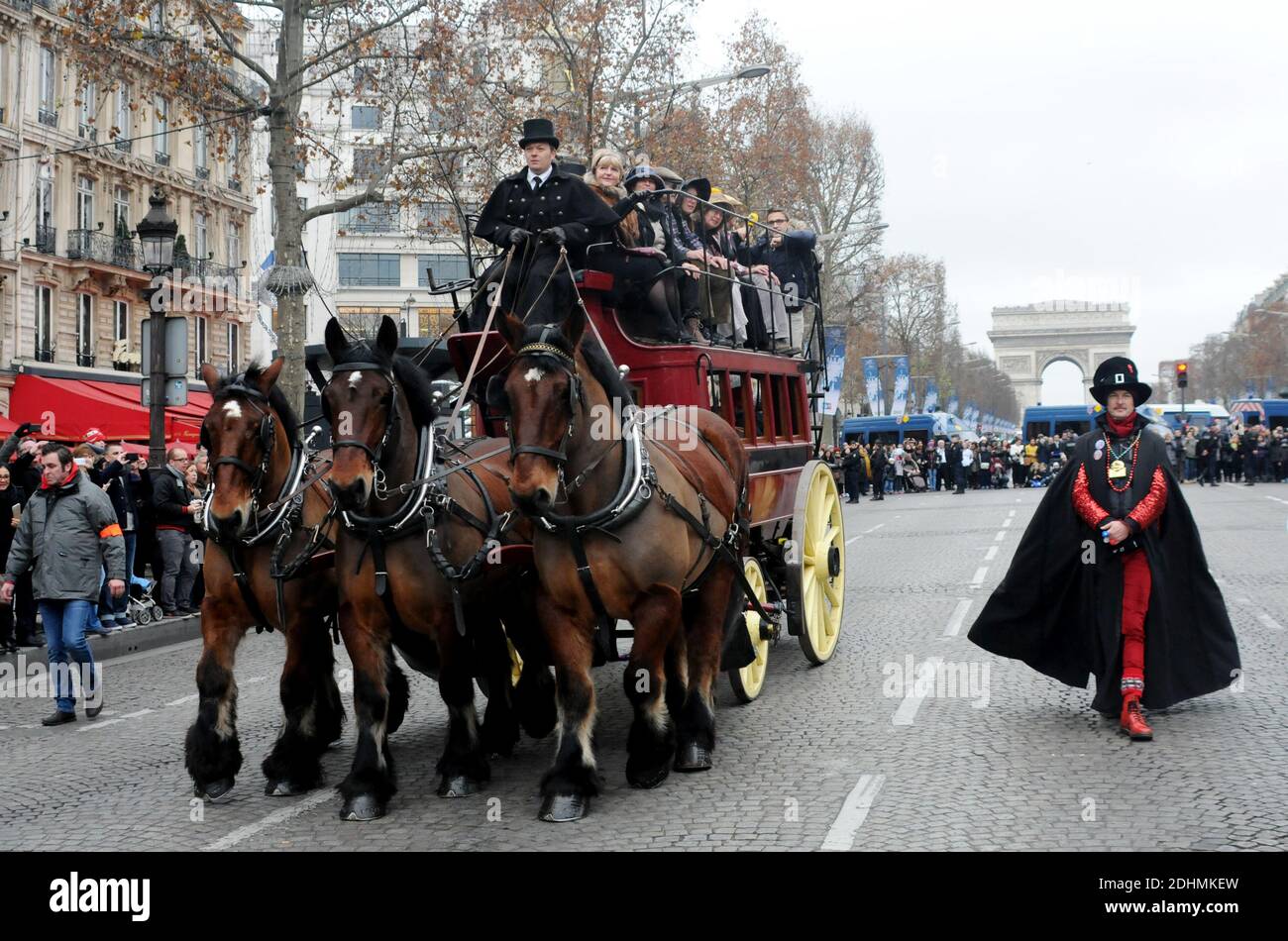 Various characters take part in a parade on January 1, 2016, along the ...