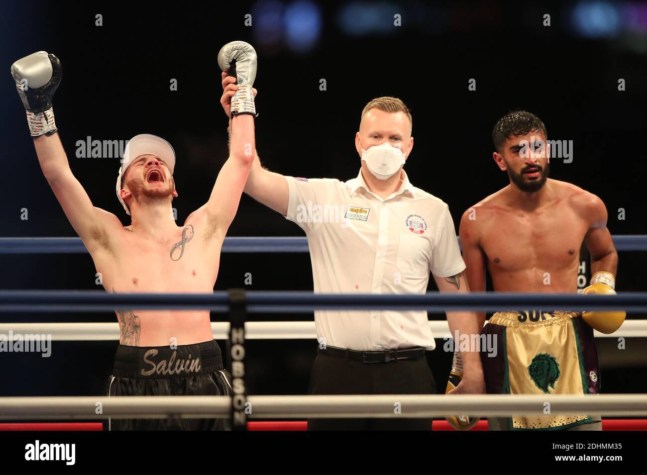Kane Salvin (left) celebrates victory against Sufyaan Ahmed in the ...