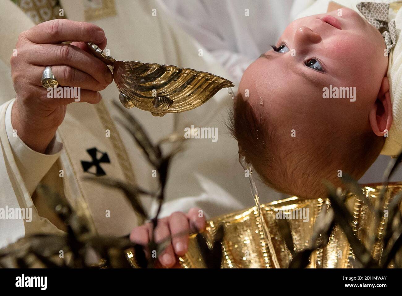 Pope Francis baptized 26 babies during a ceremony in the Sistine Chapel ...