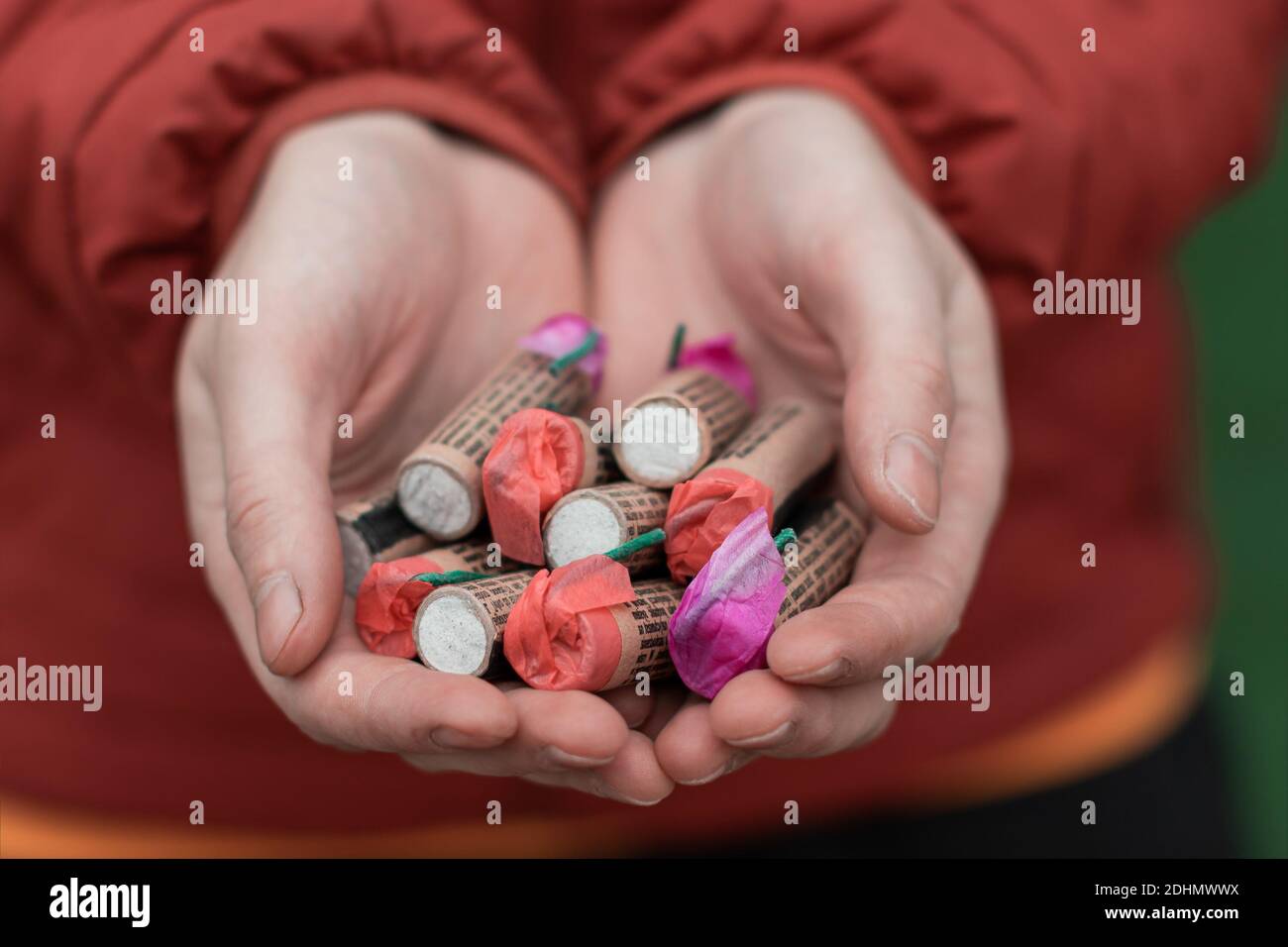 Firecrackers hand hi-res stock photography and images - Alamy